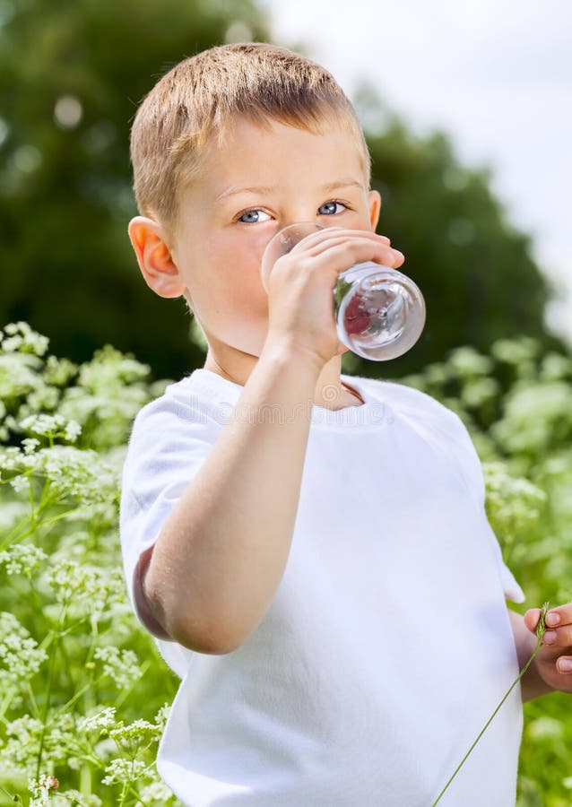 Child drinking pure water stock image. Image of cute - 21441253
