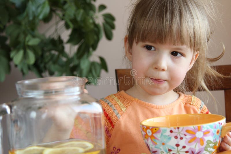 Child drinking a tea stock photo. Image of positive, drinking - 31157834