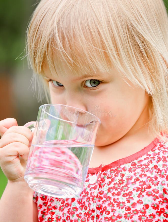 Child drinking water stock photo. Image of green, aqua - 27051234