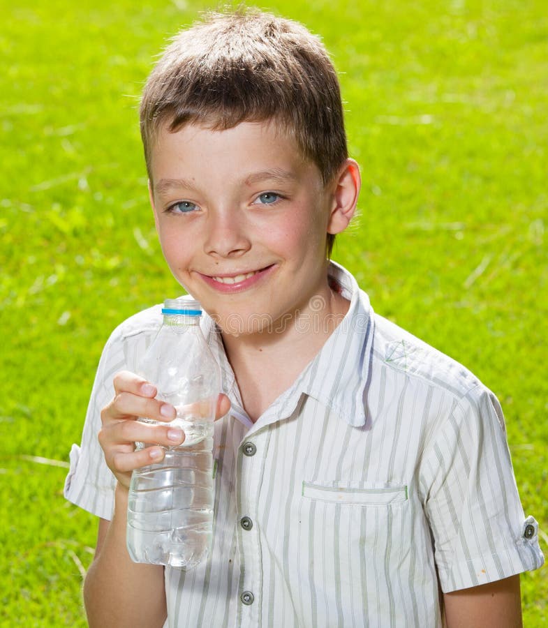 Child drinking water stock image. Image of drink, holding - 39528991