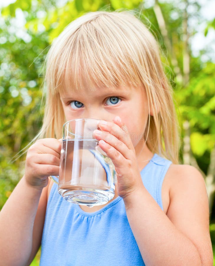 Child drinking water stock image. Image of refreshment - 33937101