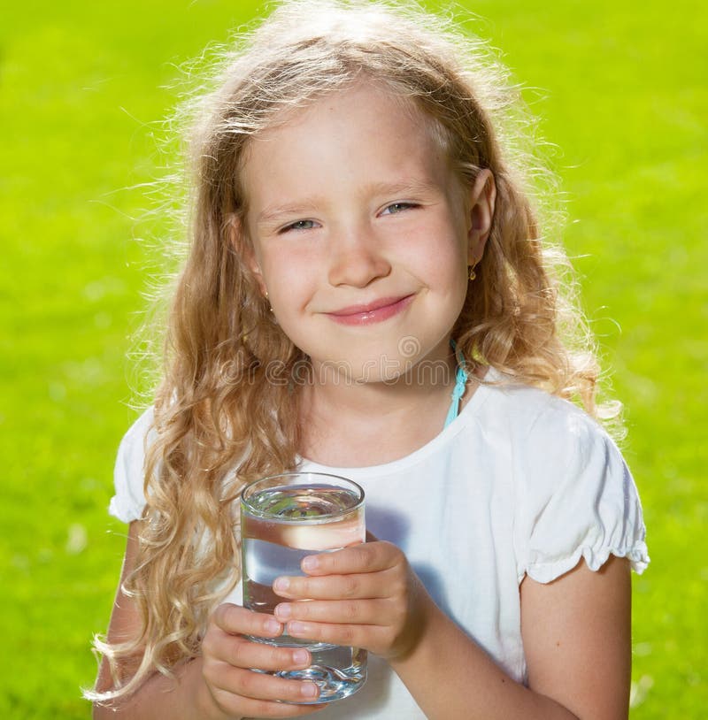 Child , drinking water stock image. Image of outdoors - 4092195