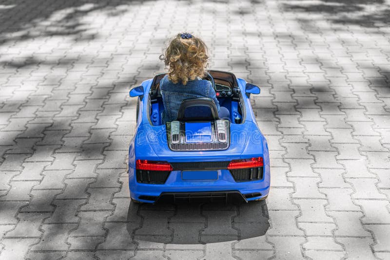 Child is Driving a Toy Car in the Park. Stock Image - Image of concept ...