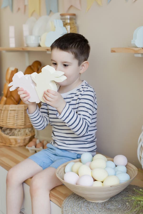 Child with Easter Eggs and Decor Stock Image - Image of easter, kitchen ...