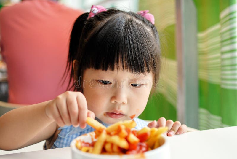 The child eat fries stock photo. Image of small, childhood - 10696594