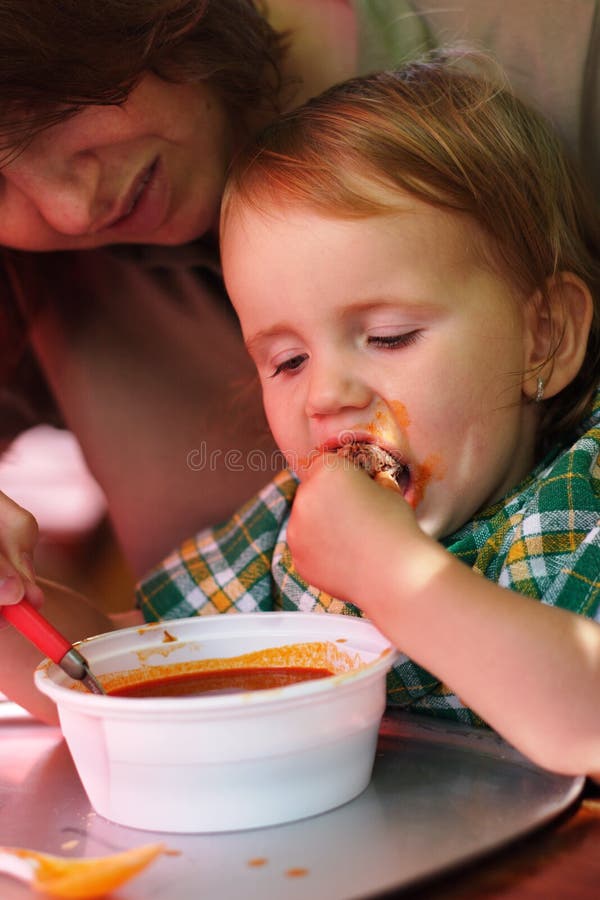 Child eating stock photo. Image of blond, concentrate - 7447704