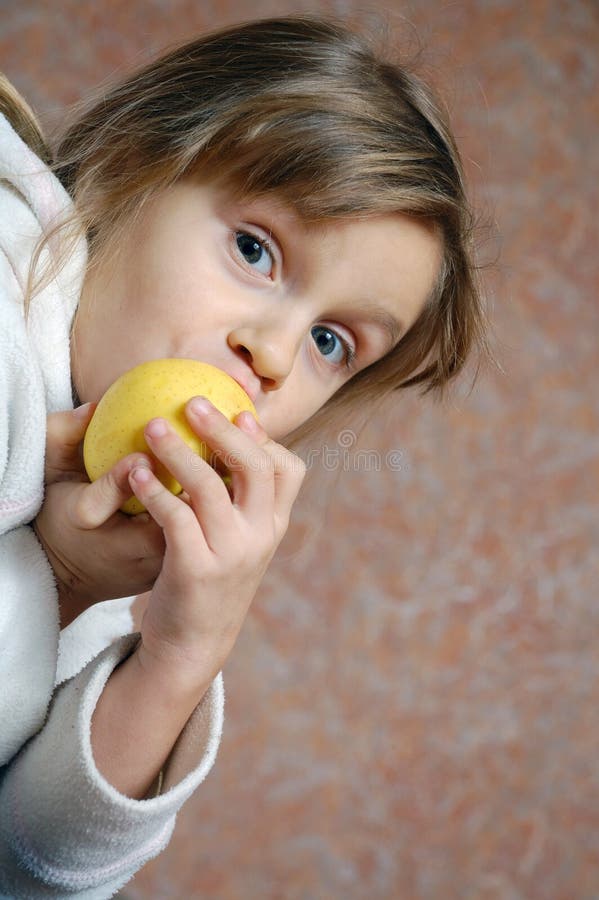 Child eating an apple stock photo. Image of close, girl - 11791022