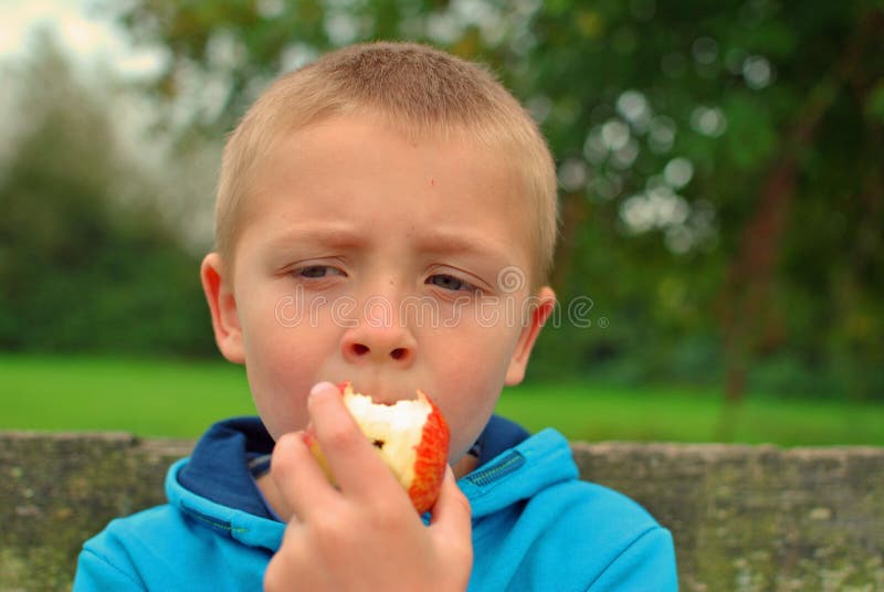 Child eating apple stock image. Image of healthy, blonde - 46266215
