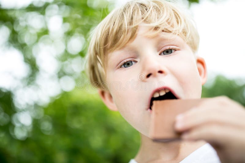 Child Eating Biscuit with Chocolate Stock Photo - Image of cookies ...