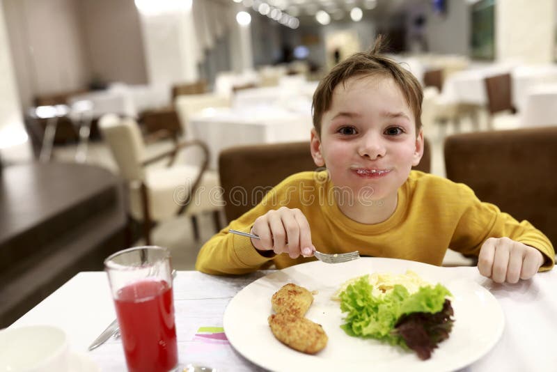 Child Eating Chicken Cutlet Stock Photo - Image of childhood, gourmet ...
