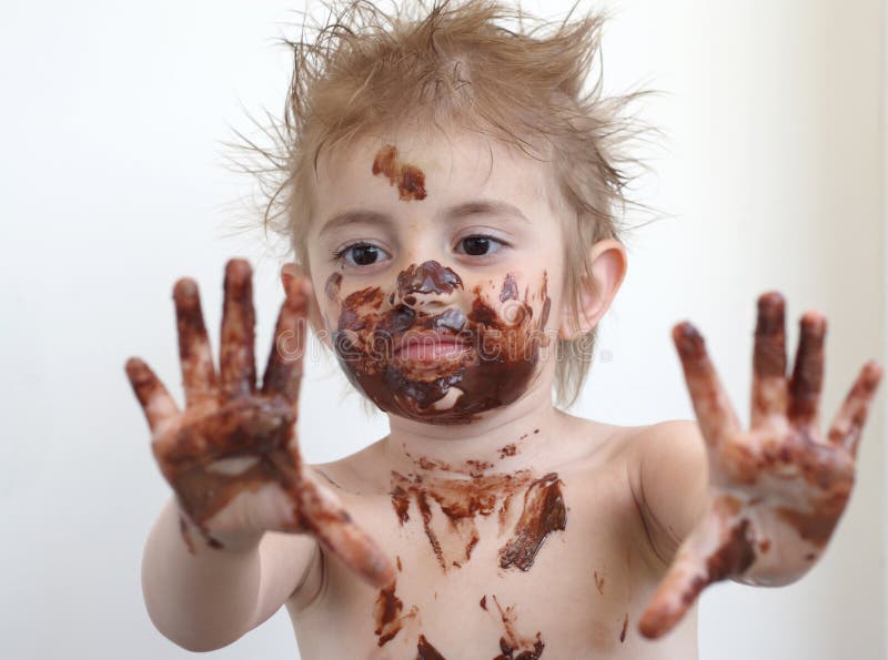 Child eating chocolate stock photo. Image of messy, eating - 9596916