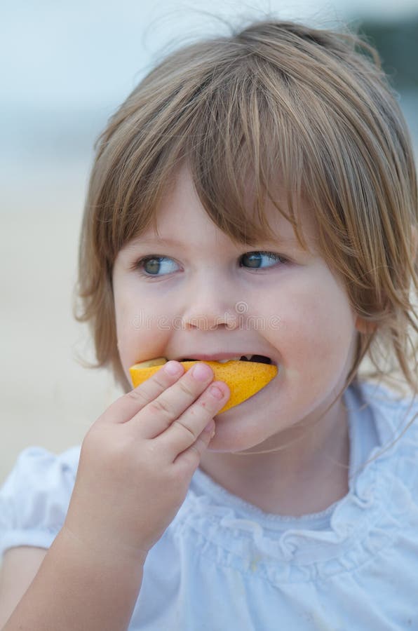 Child eating fruit stock photo. Image of portrait, fruit - 19272224