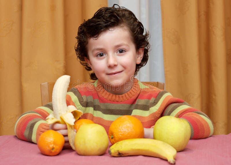 Child eating fruit stock image. Image of oranges, people - 4165343