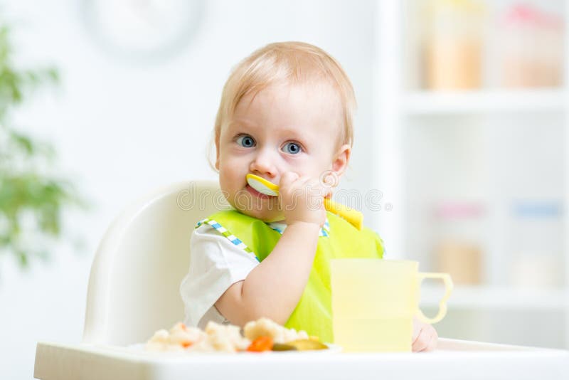 Child eating healthy food stock image. Image of feeding - 51449111