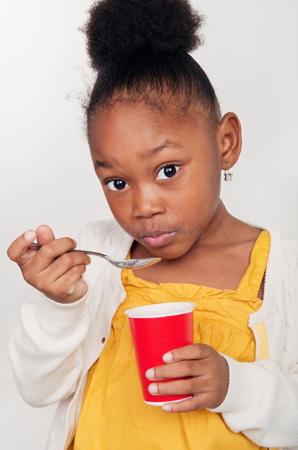 Child Eating Healthy Yogurt Stock Image - Image of yellow, young: 17964135