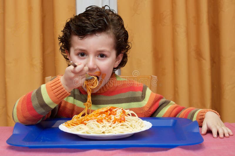 Child eating in his house stock image. Image of health - 4432507