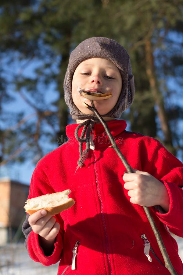 Child Eating Meat on a Picnic in Nature in the Forest Stock Image ...