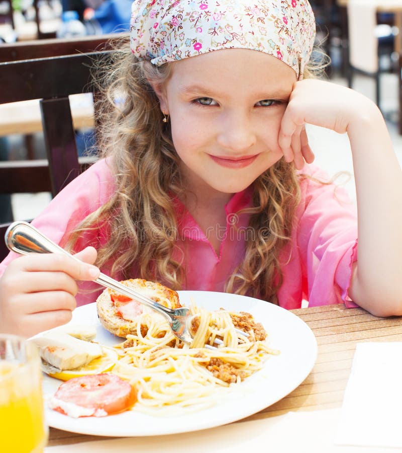 Child eating pasta stock photo. Image of cute, female - 38477438