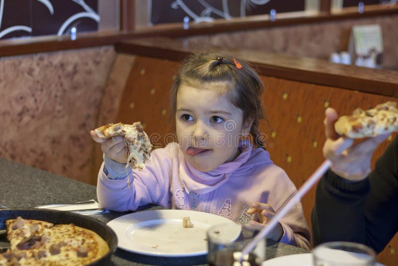 Child eating pizza stock image. Image of cheese, european - 22002261