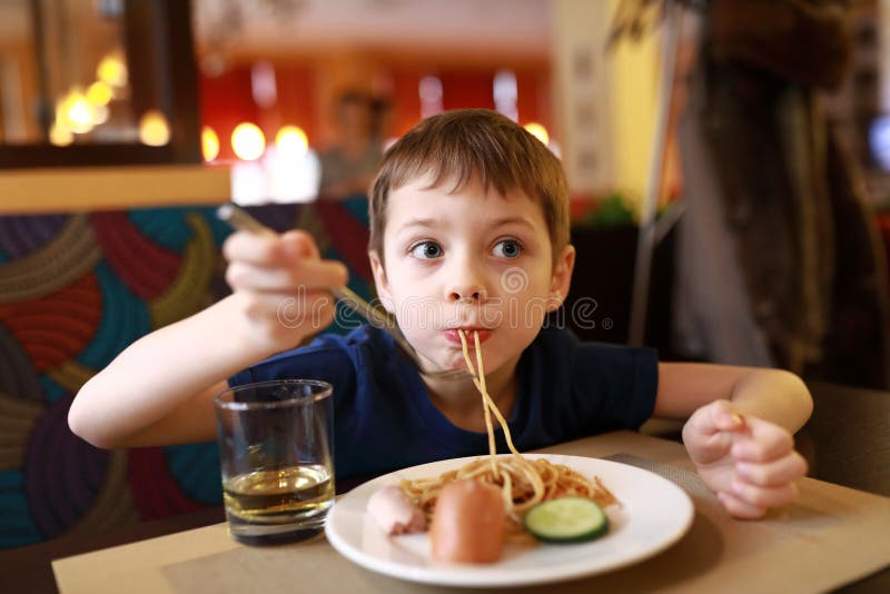 Child Eating Spaghetti for Breakfast Stock Photo - Image of face ...