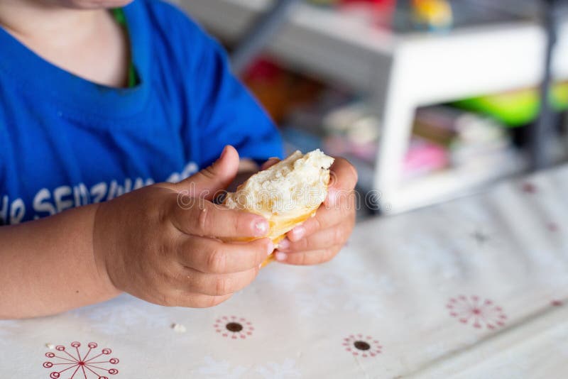 Child Eating Sweet Bread by the Desk Stock Image - Image of baby ...