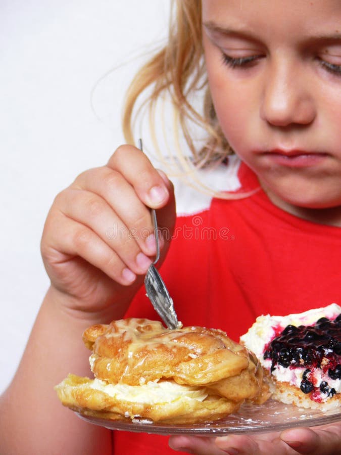 Child is eating sweets stock photo. Image of small, portrait - 5646052