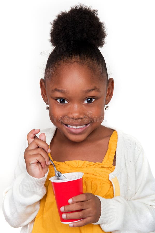 Child Eating Yogurt stock image. Image of toothy, child - 17751531