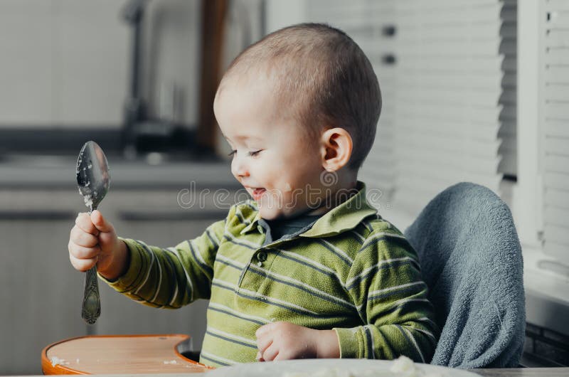 The Child Eats Mashed Potatoes Stock Image - Image of family, food ...
