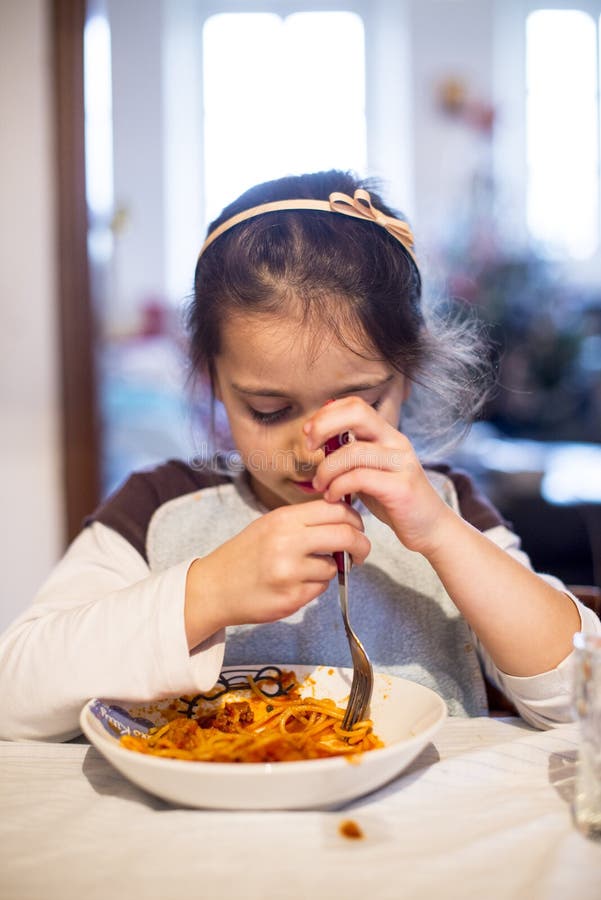 Child eats spaghetti stock photo. Image of child, dinner - 107804882