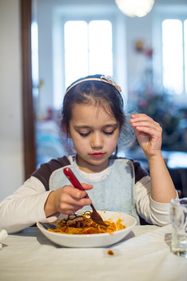 Child eats spaghetti stock photo. Image of caucasian - 107804524