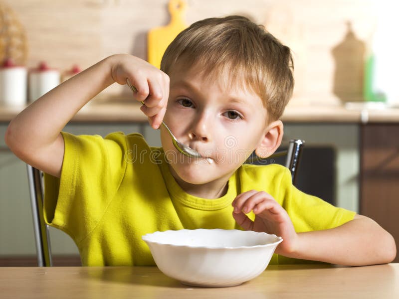 Child Eats from a White Cup Stock Image - Image of people, little: 7181499