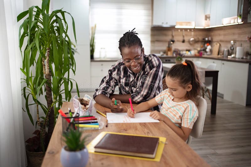 Child Enjoy Creative Time Drawing at a Table of Art Supplies Stock ...