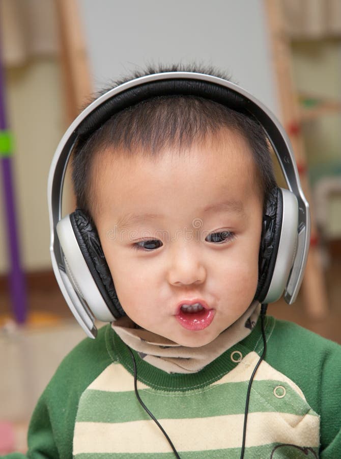 Child enjoy music stock image. Image of sound, listening - 17882193