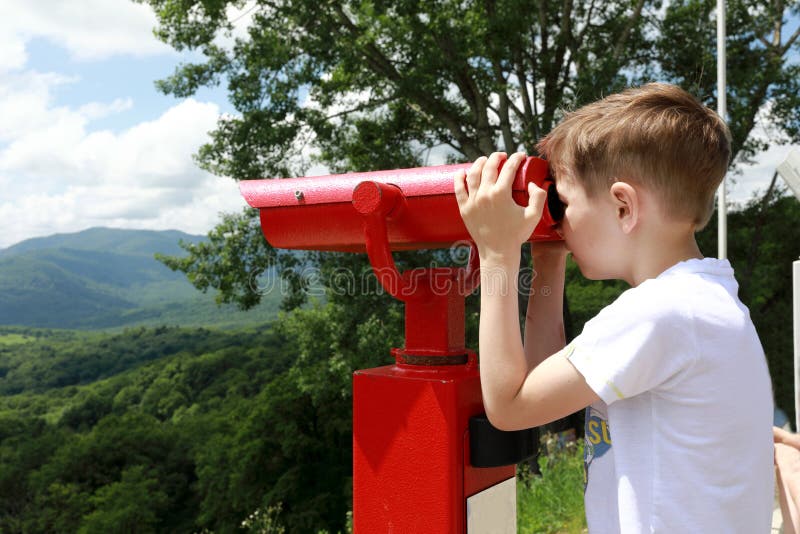 Child Examines Azish-Tau Ridge through Binoculars Stock Image - Image ...