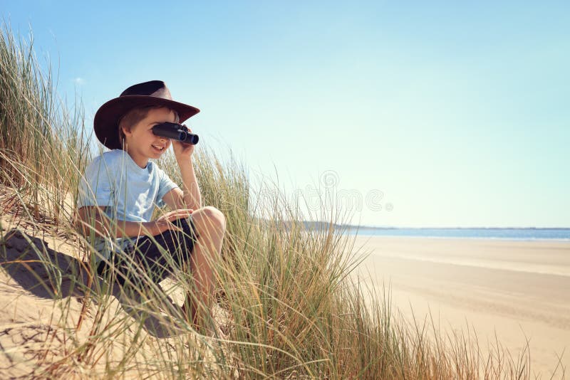 Child Explorer with Binoculars at the Beach Stock Image - Image of ...