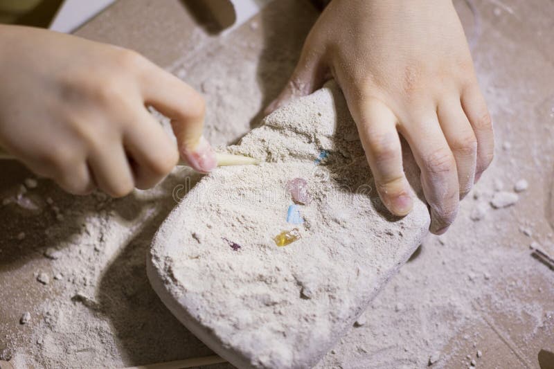 The child extracts stones stock image. Image of mess - 317829321