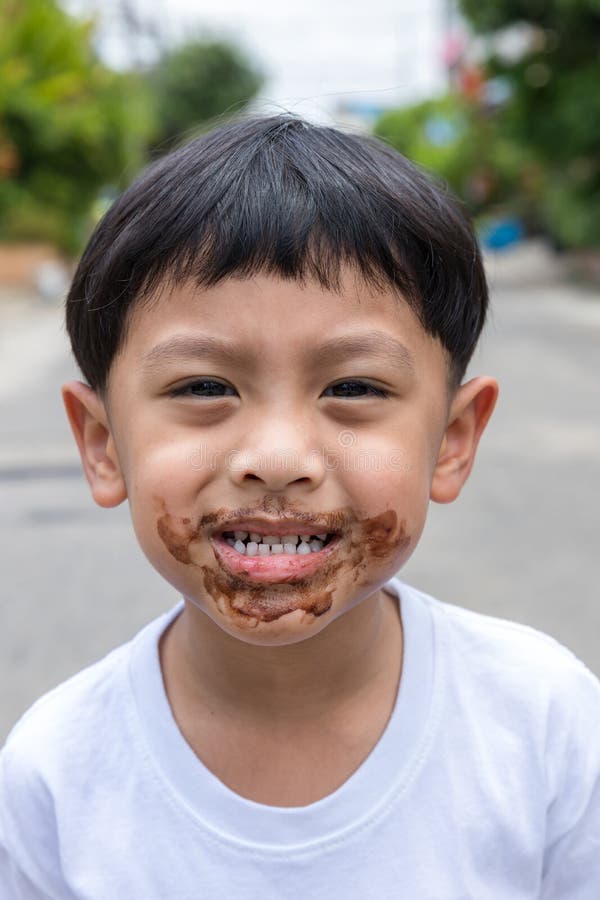 Child Face Messy and Dirty by Chocolate Ice Cream. Child with Face ...