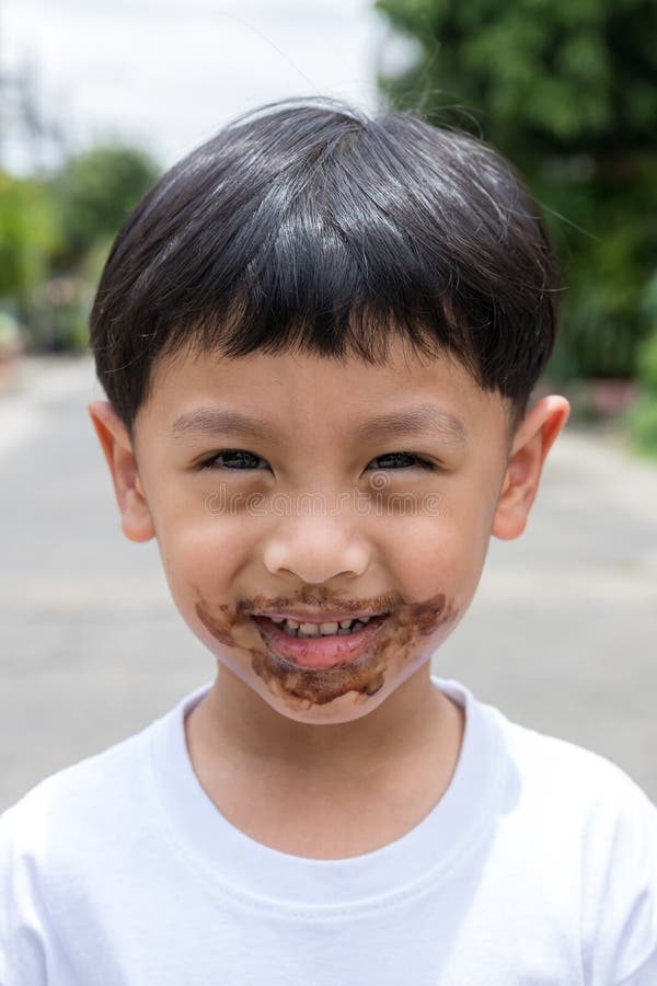 Child Face Messy and Dirty by Chocolate Ice Cream. Child with Face ...