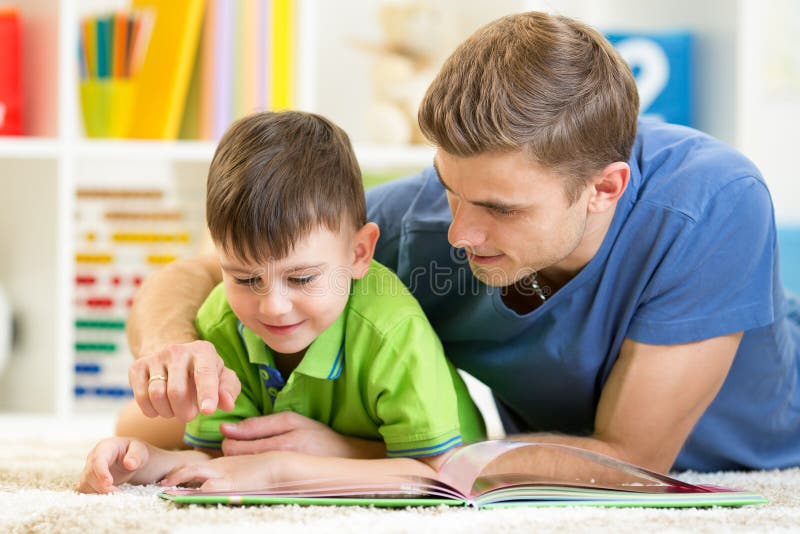 Child and Father Read a Book on Floor at Home Stock Image - Image of ...