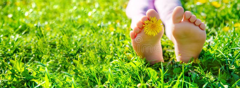 Child Feet on the Grass. Selective Focus Stock Image - Image of girl ...