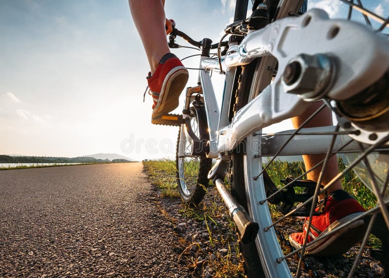 Child Feet in Red Sneakers Start To Ride a Bicycle Stock Image - Image ...