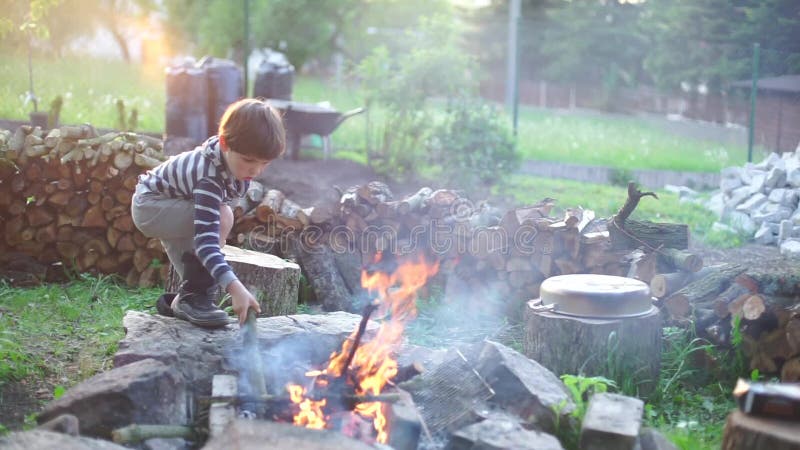 Child fires a fire stock footage. Video of forest, beautifully - 150243330