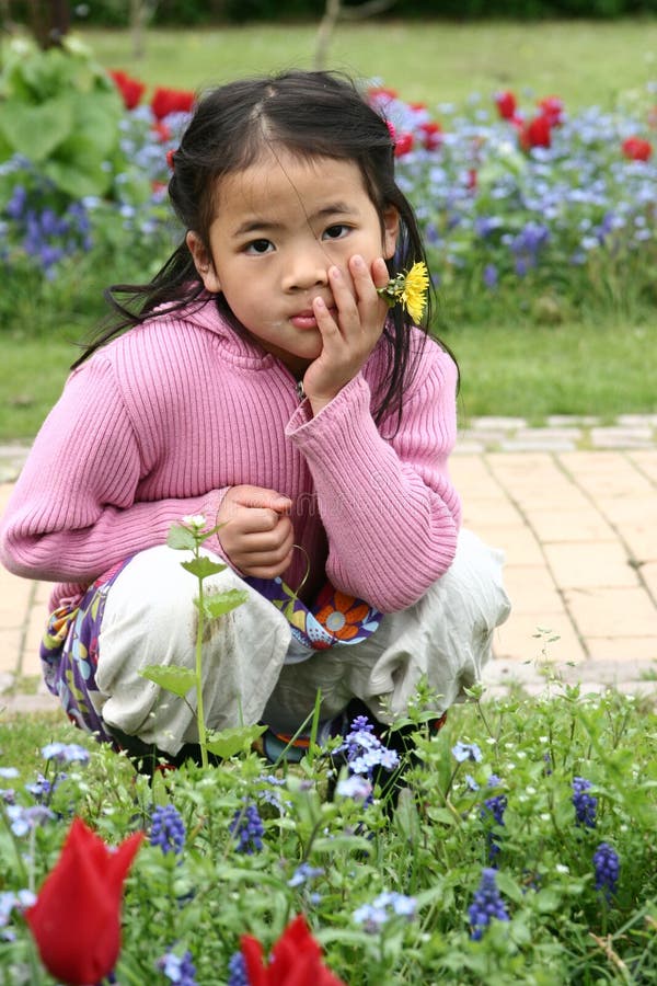 Adorable Child Girl with Flower. Summer Green Nature Stock Photo ...
