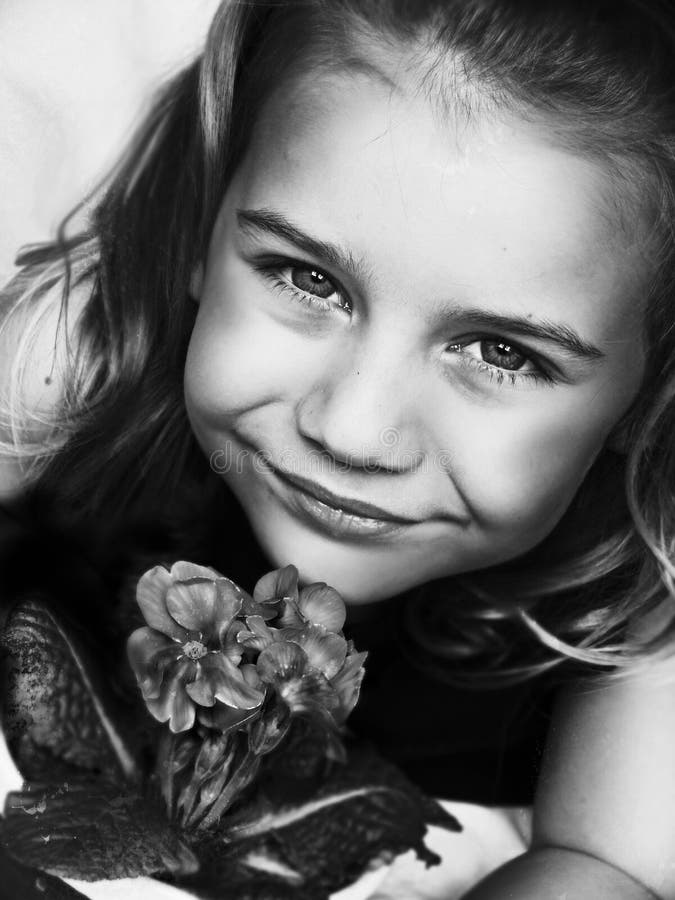 Sad boy with flower stock image. Image of child, green - 2952177