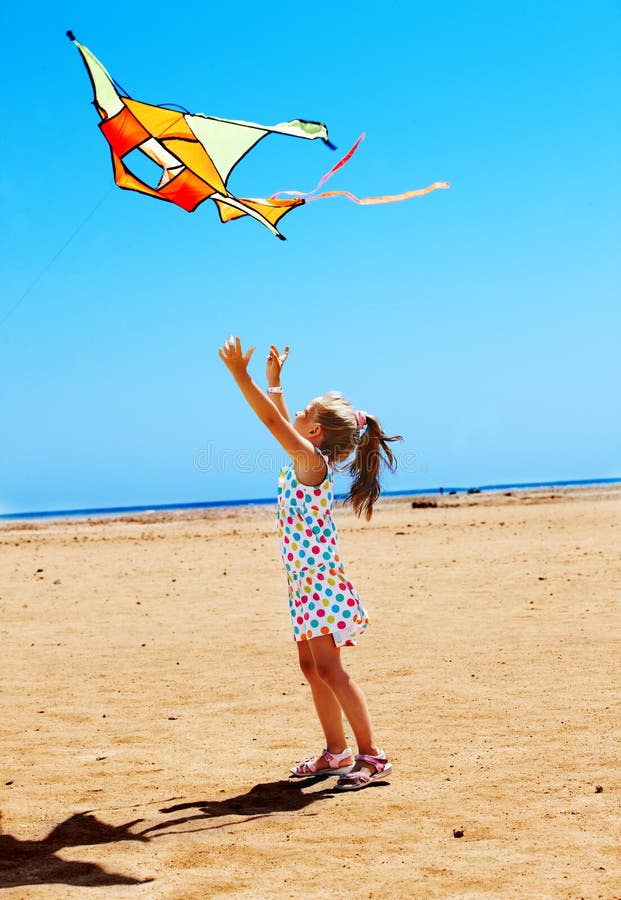 Kid flying kite outdoor. stock photo. Image of orange - 30021274