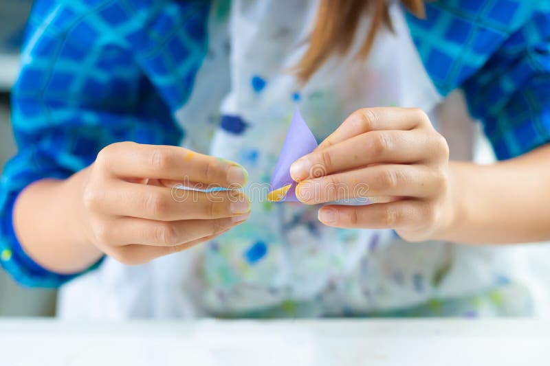 Child Folds Paper with Its Hands Stock Image - Image of origami ...