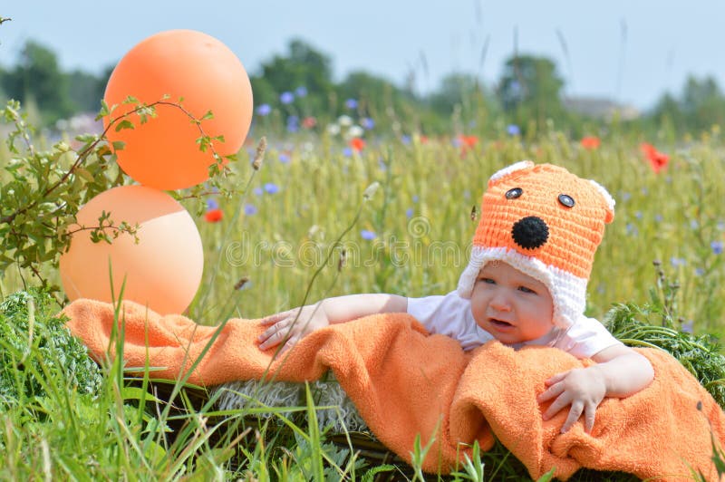 Child in fox suit stock photo. Image of childhood, flower - 58901060
