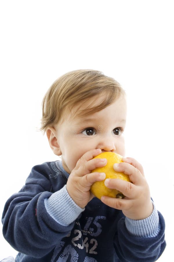 Child with lemon. stock photo. Image of pout, citric - 59479852