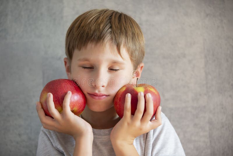 Child with fruit stock photo. Image of clever, face - 190626558