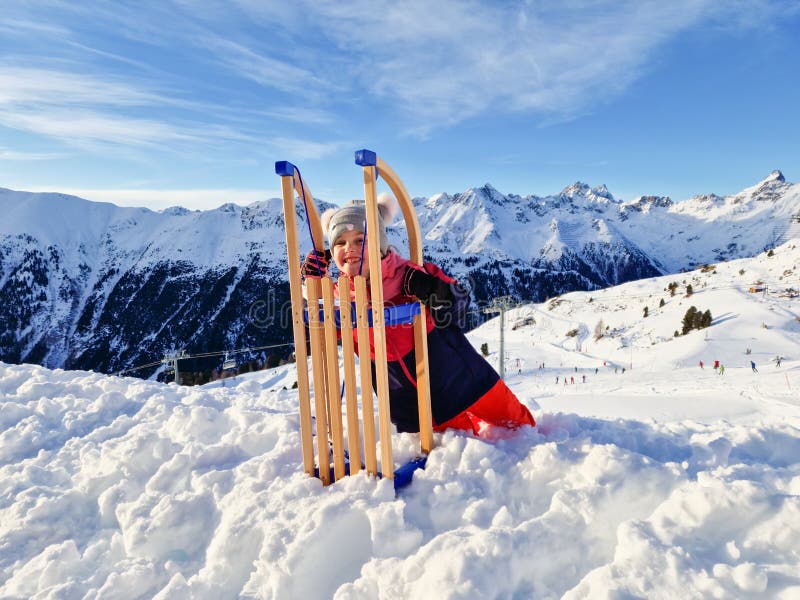 Child Fun with Sled stock photo. Image of paznaun, park - 267086226
